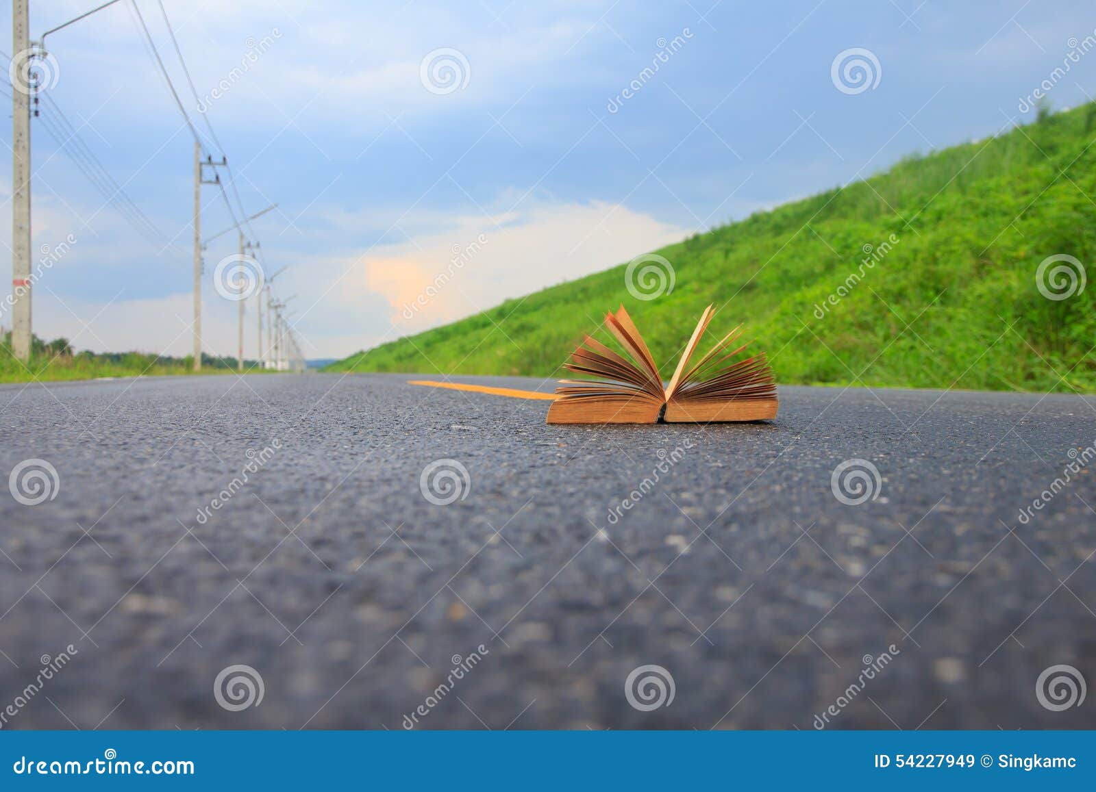Stock Photo - Open Book on Road Outdoors Stock Image - Image of gray ...