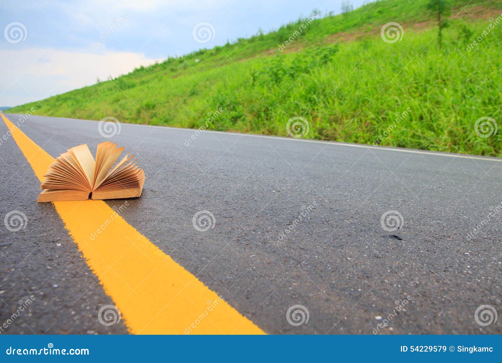 Stock Photo - Open Book on Road Outdoors Stock Image - Image of book ...
