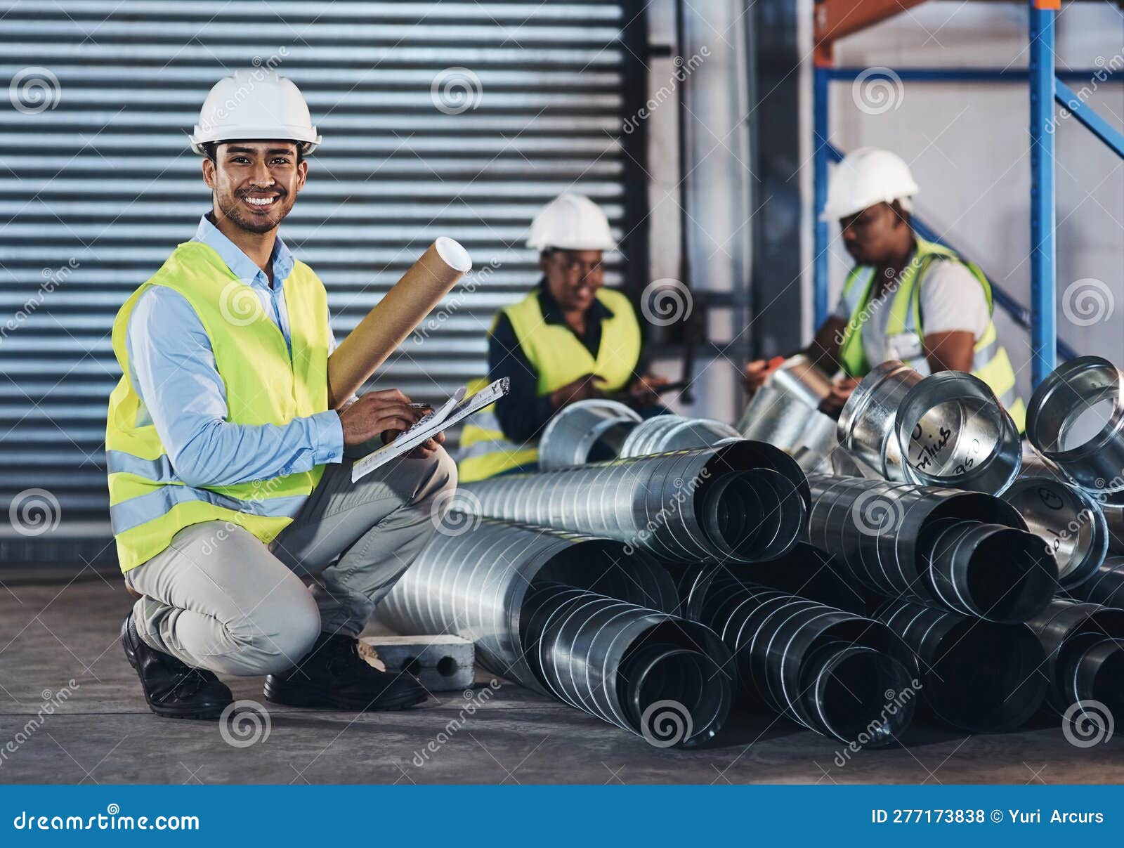 Stock-take is Part of the Job. a Handsome Young Contractor Crouching ...