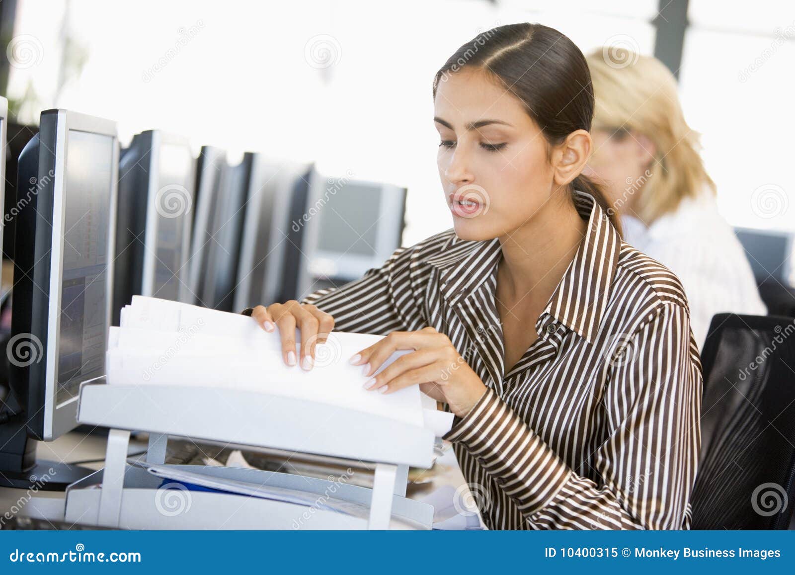 Stock Trader Going through Paperwork Stock Image - Image of working ...