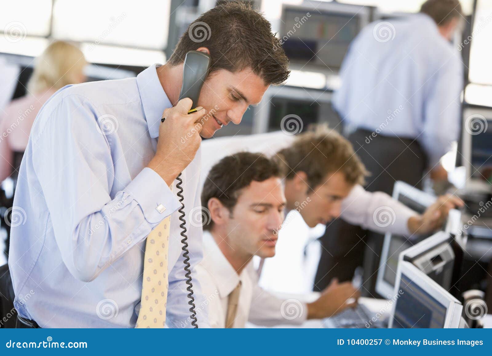 Stock Trader on the Phone stock image. Image of concentration - 10400257