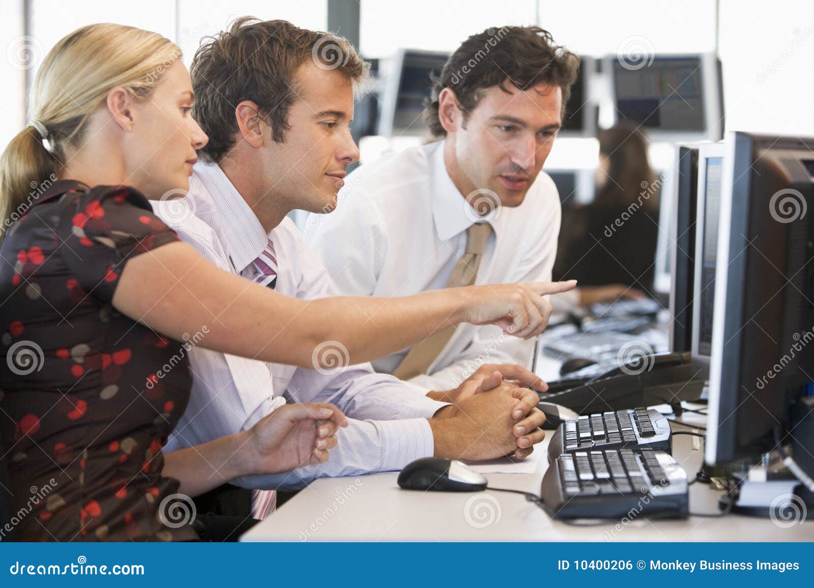 Stock Trader Team at Work stock photo. Image of discussing - 10400206