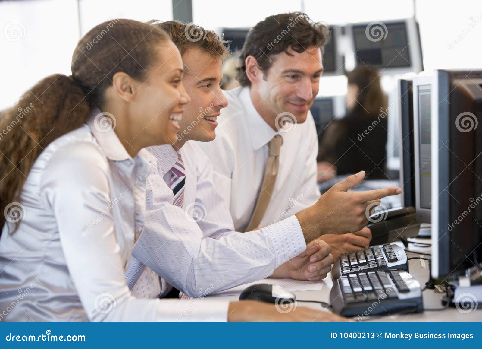 Stock Trader Team at Work stock image. Image of concentration - 10400213