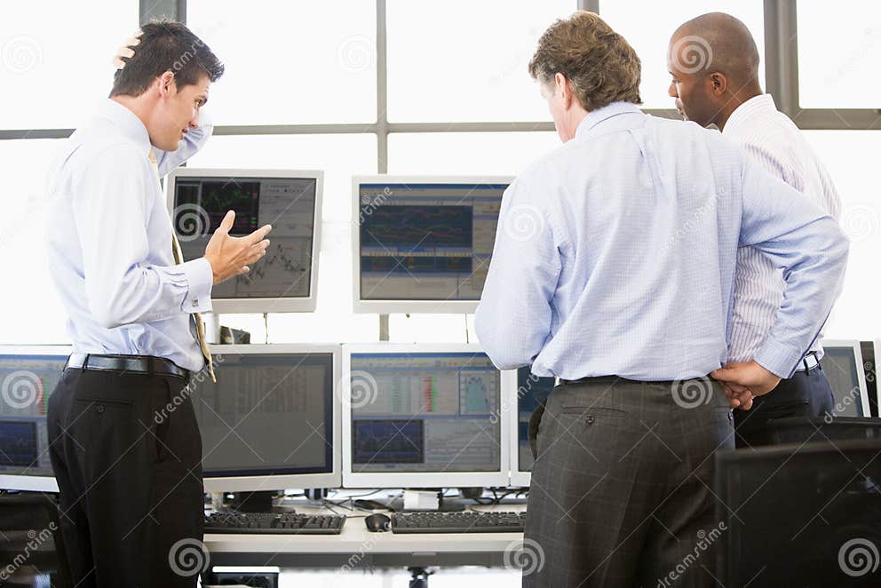 Stock Traders Viewing Monitors Stock Photo - Image of trader, dealing ...