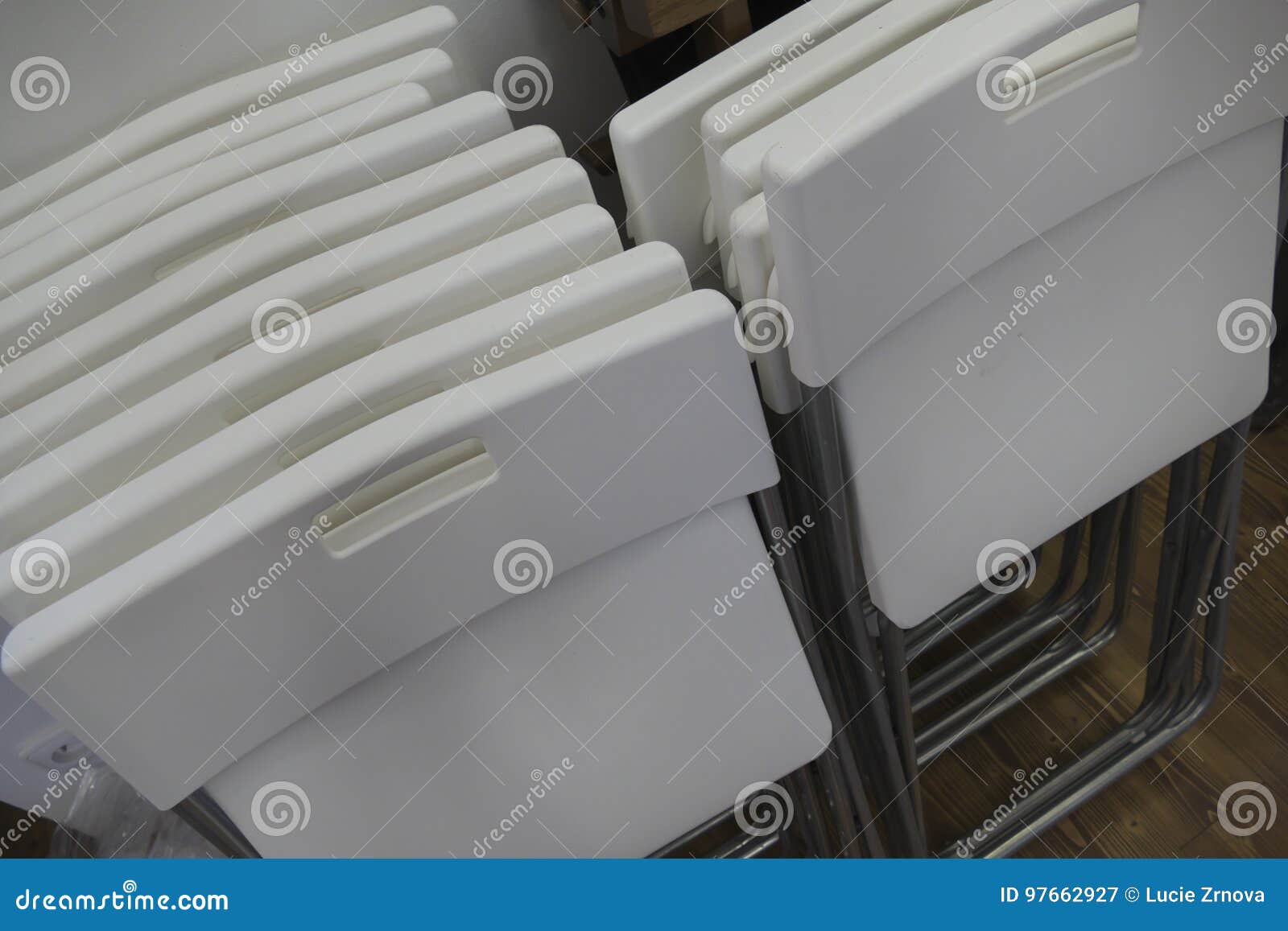 Stocked White Stackable Plastic Chairs Stock Image - Image of chairs ...