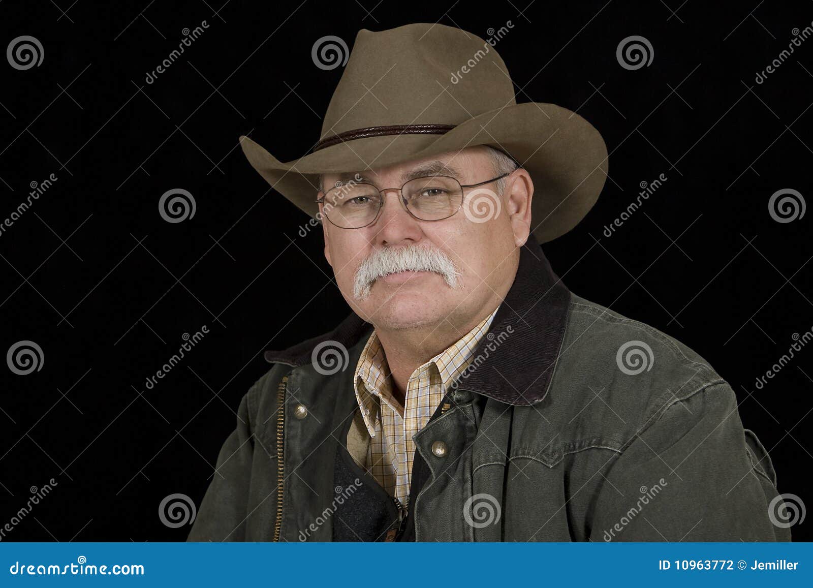 Stoic Looking Cowboy stock photo. Image of glasses, mean - 10963772
