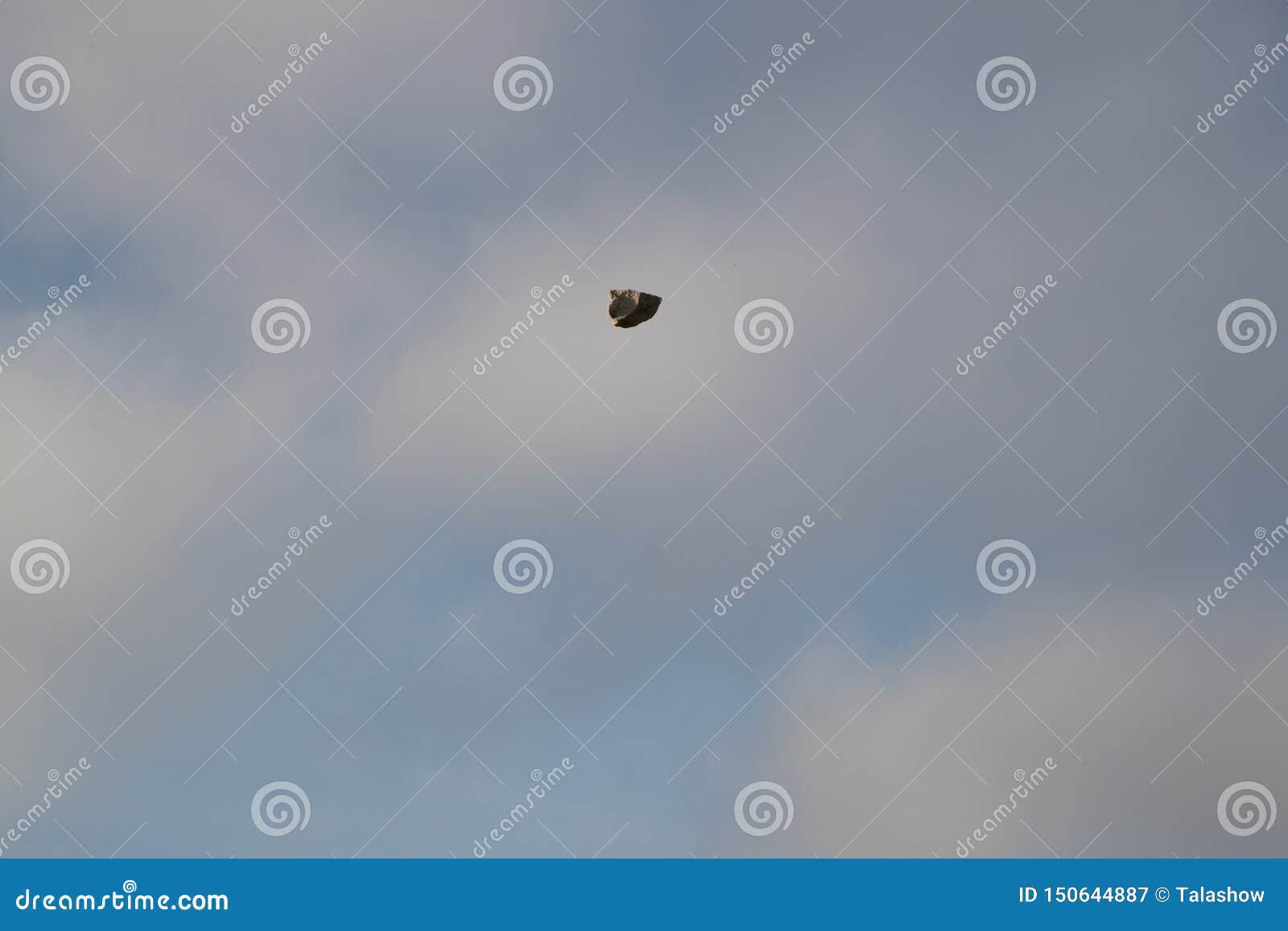 Stone in the Air Against the Sky in the Daytime Stock Image - Image of ...