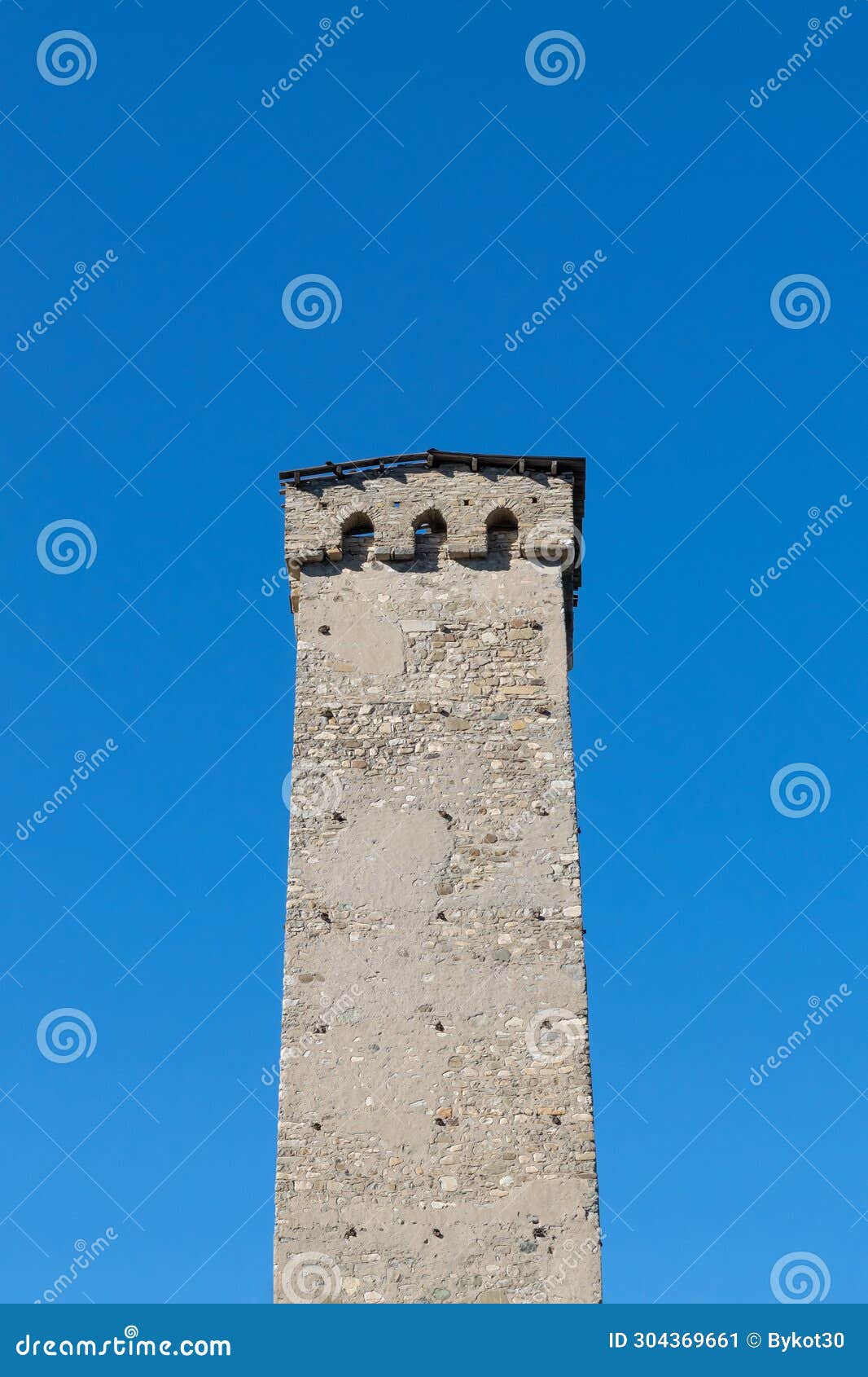 Stone Ancient Rectangular Tower Against the Blue Sky Stock Image ...