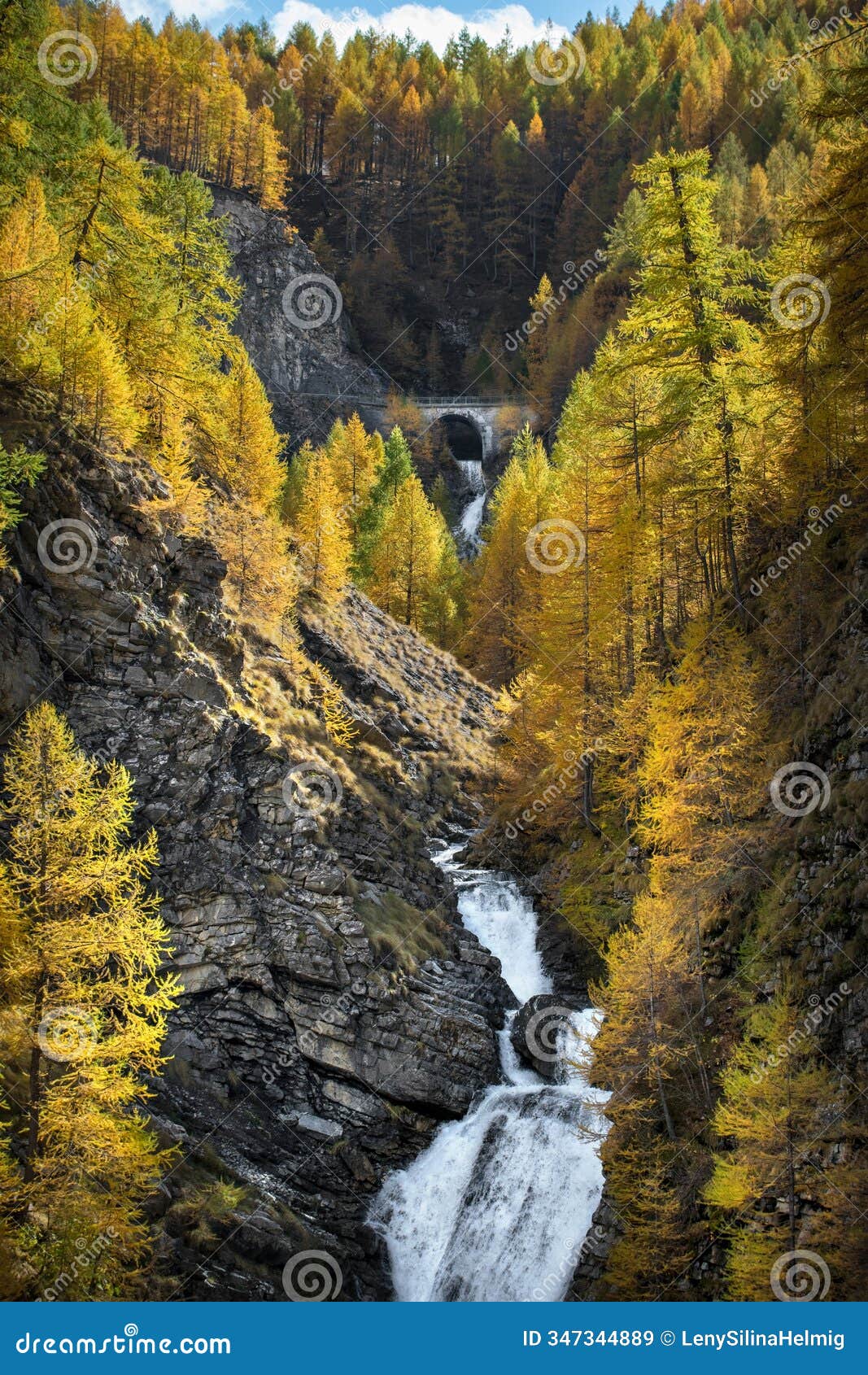 A Stone Arch Bridge with a Waterfall Stock Image - Image of waterfall ...