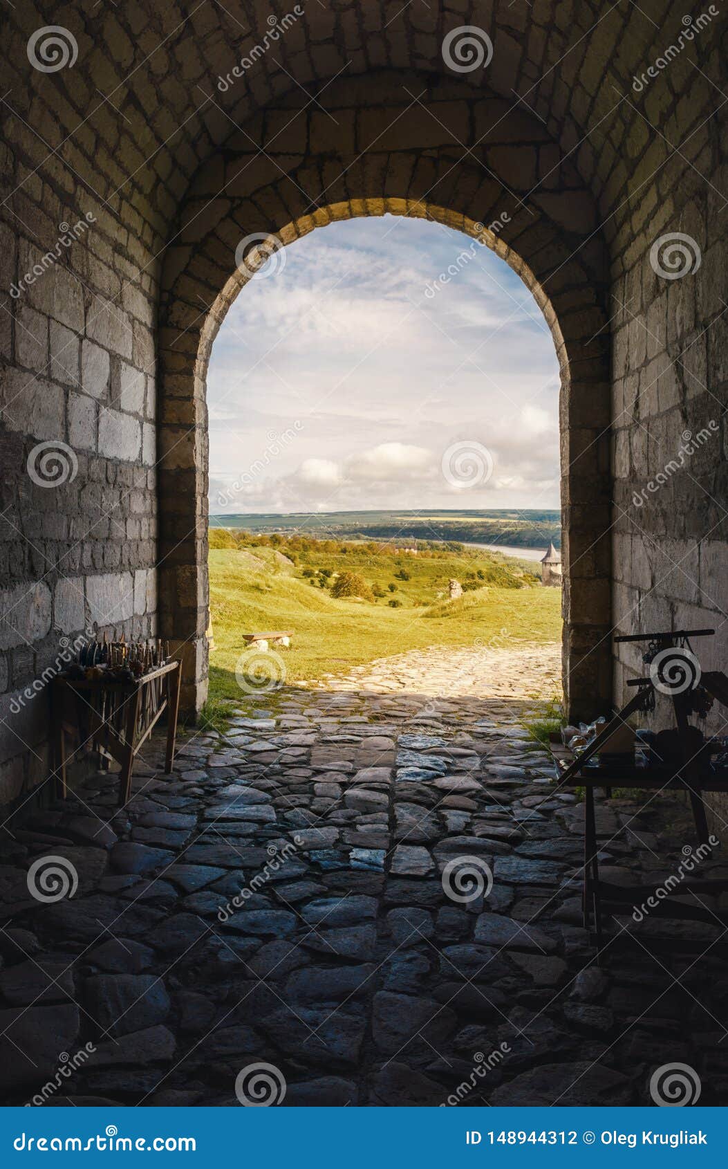 Stone Arch and Cobblestone Walkway Stock Photo - Image of light, path ...