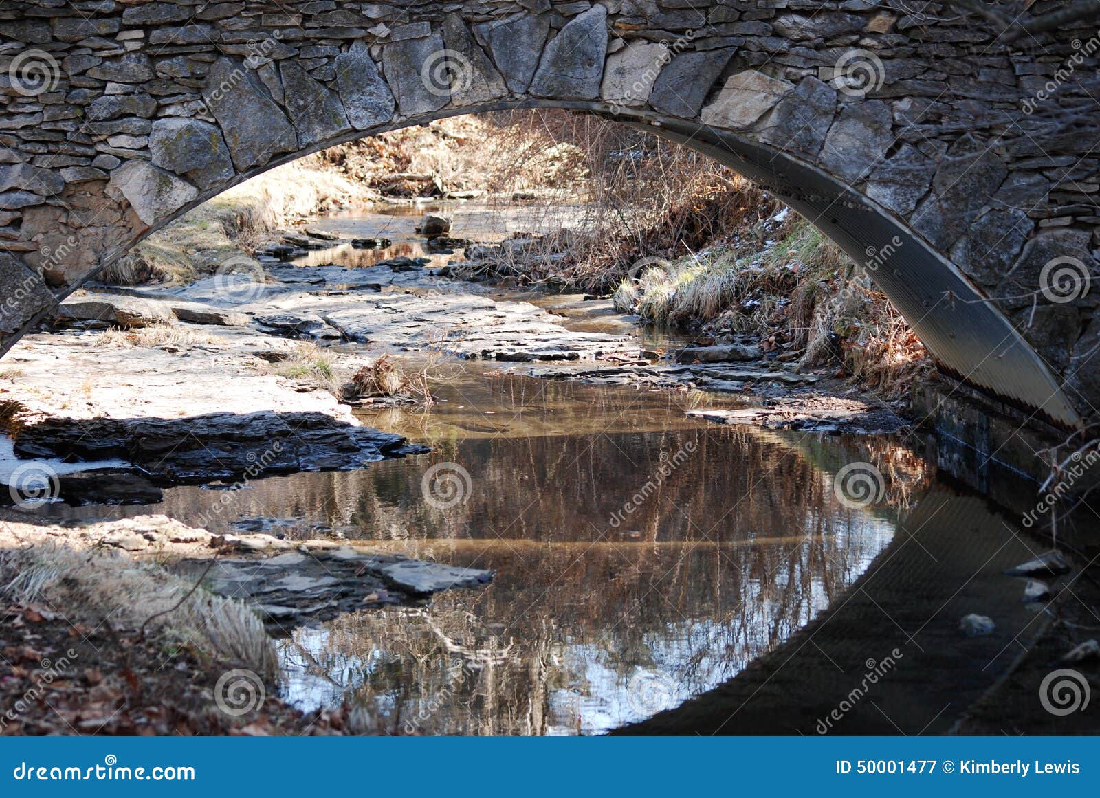 Stone Arch with a Creek with Reflections. Stock Image - Image of brown ...