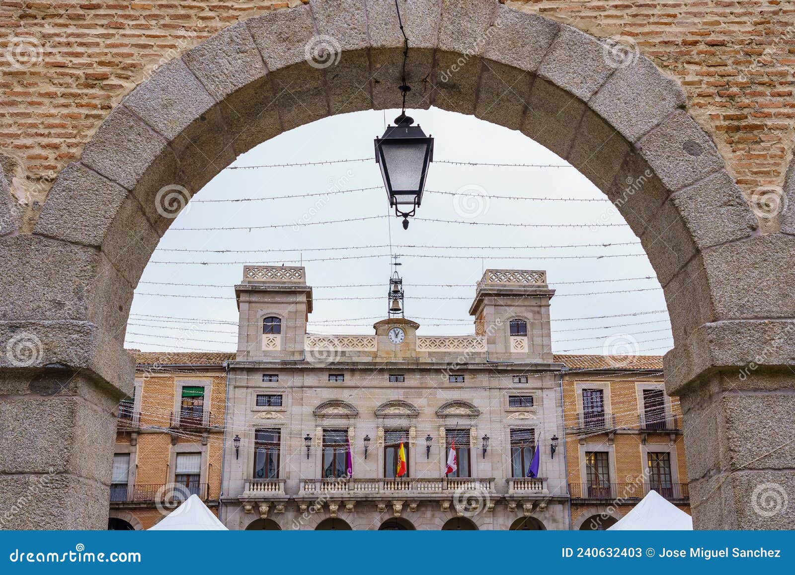 Stone Arch that Frames Old Buildings in a Rectangular Plaza in Avila ...