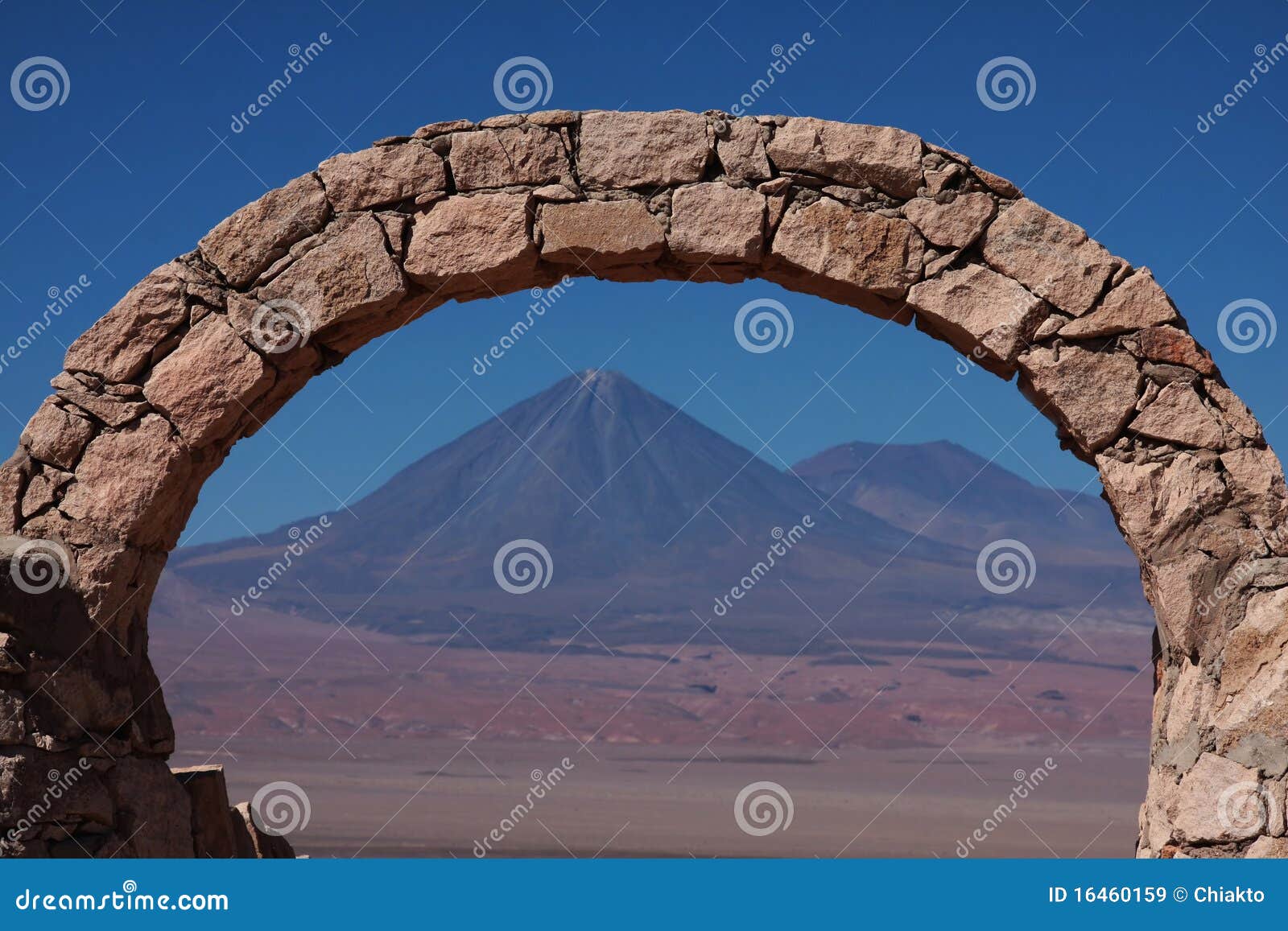Stone Arch in Front of a Volcano in Chile Stock Image - Image of chile ...