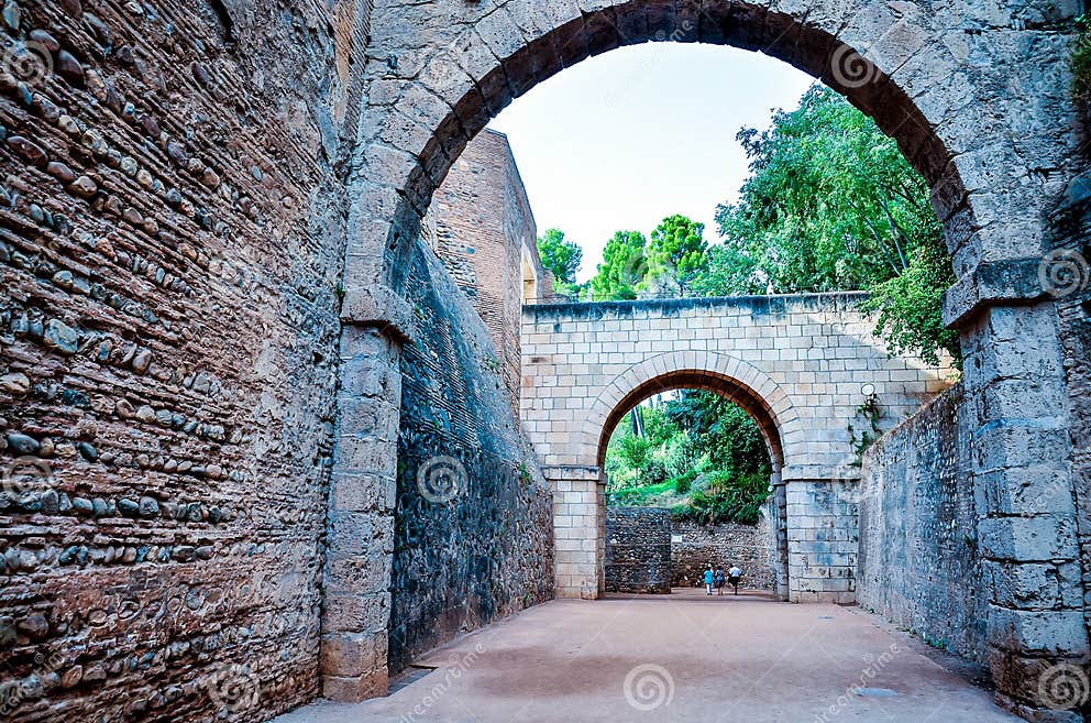 A Stone Archway with a Tree Growing Out of it Stock Image - Image of ...
