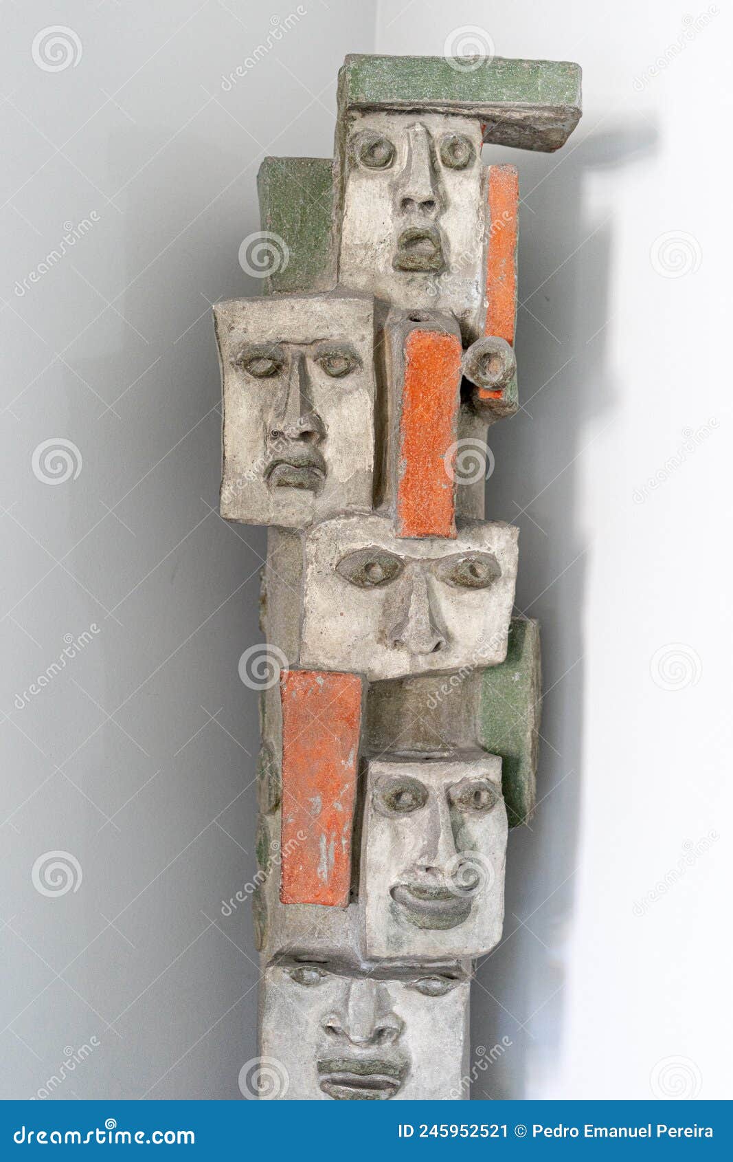 Stone Artwork of Human Faces Stacked in a Column. Editorial Photo ...