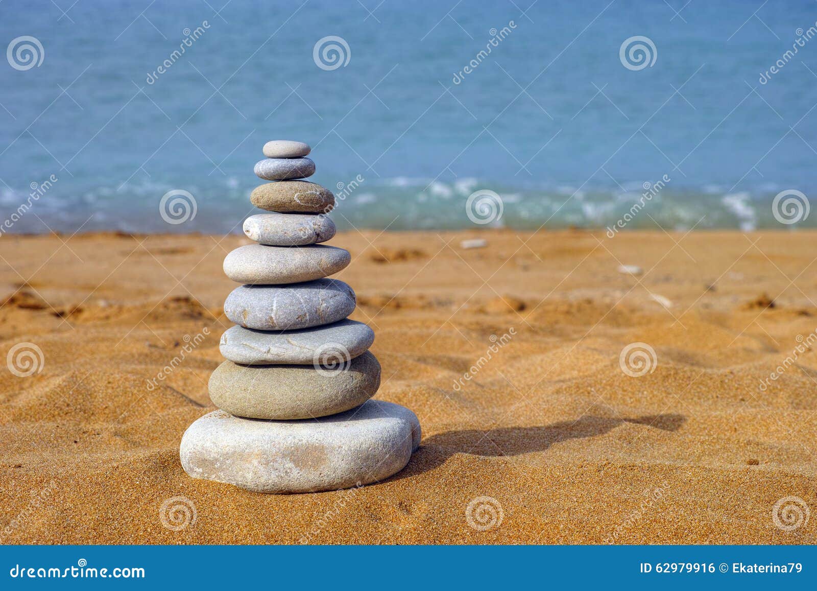 Stone balance on beach stock photo. Image of stone, peace - 62979916