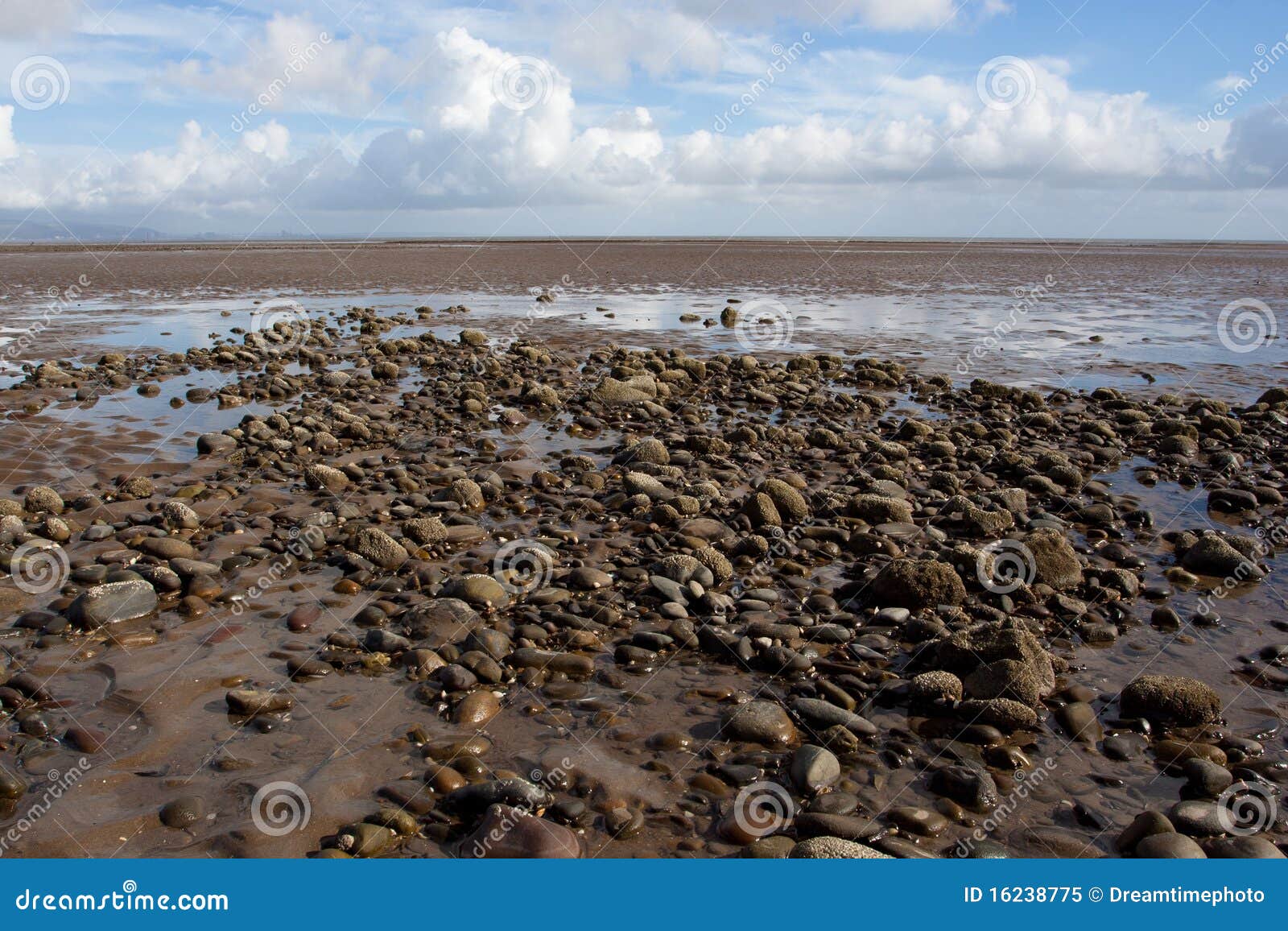 Stone on beach stock image. Image of horizon, stone, clouds - 16238775