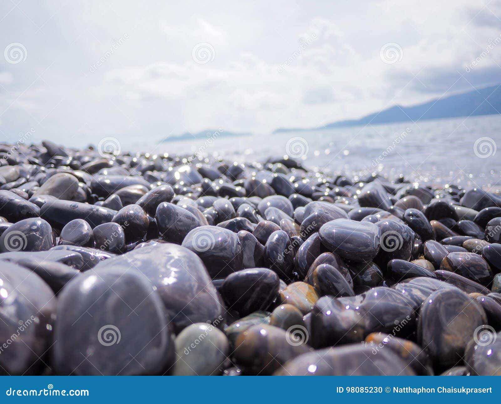 Stone beach stock photo. Image of blue, waves, calm, pebble - 98085230
