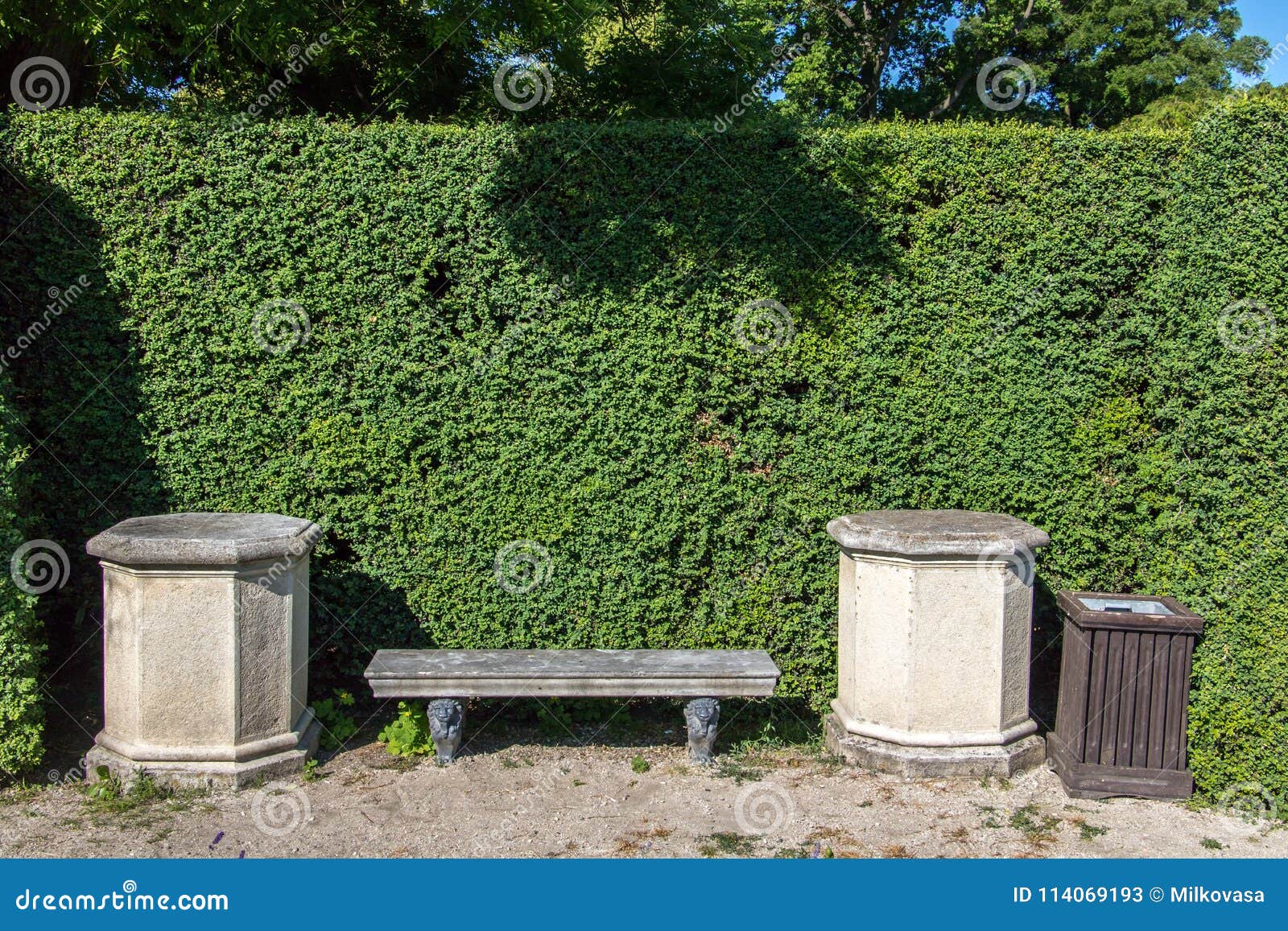 Stone bench in the park stock image. Image of place - 114069193