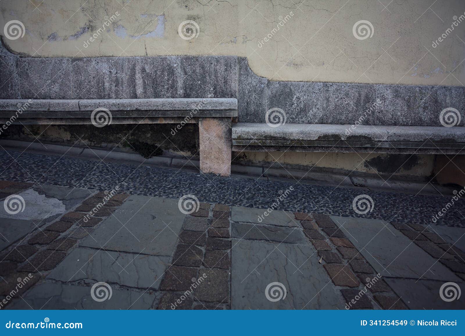 Stone benches in a wall stock image. Image of benches - 341254549