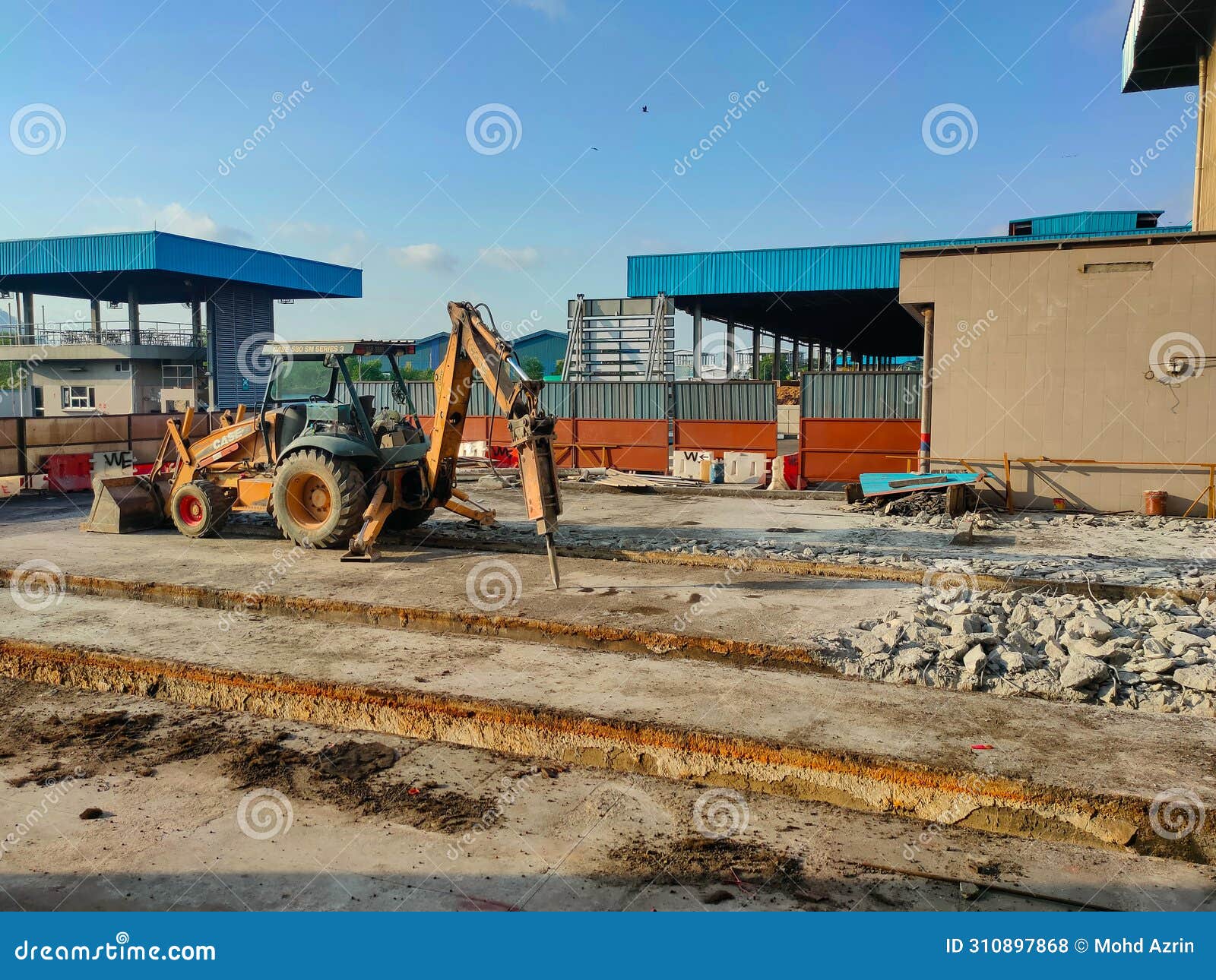 Stone Breaking Machinery that is on the Construction Site Area that is ...