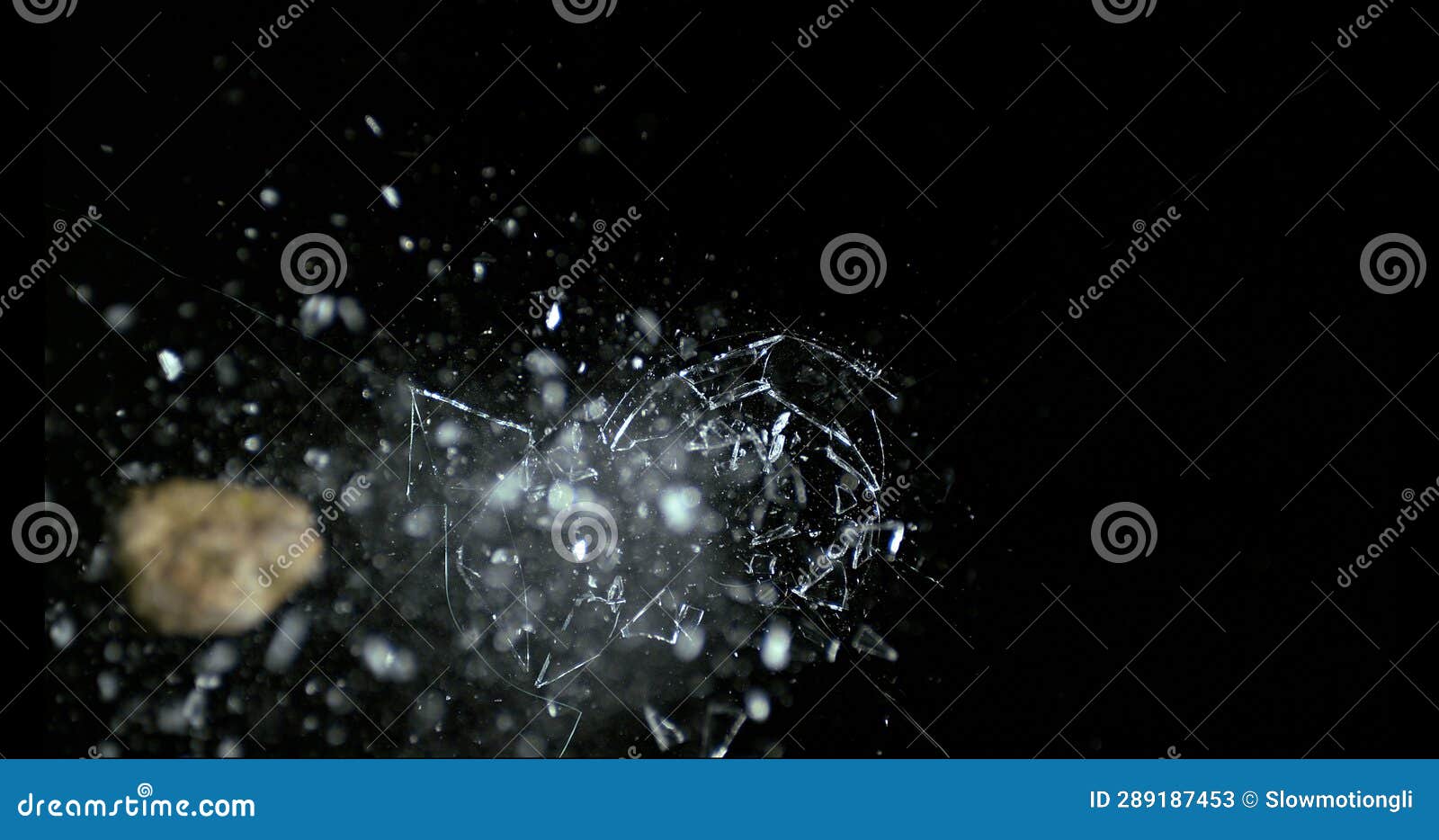Stone Breaking Pane of Glass Against Black Background Stock Image ...
