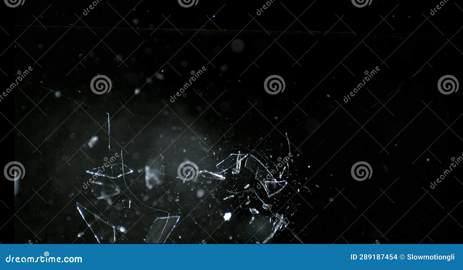 Stone Breaking Pane of Glass Against Black Background Stock Photo ...