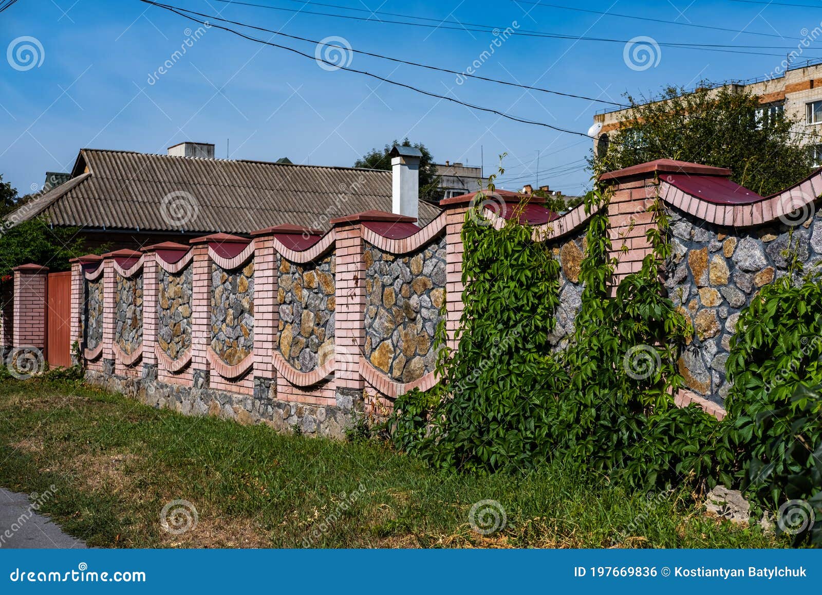 Stone and Brick Fence. Decorative Cracked Real Stone Wall Surface with ...