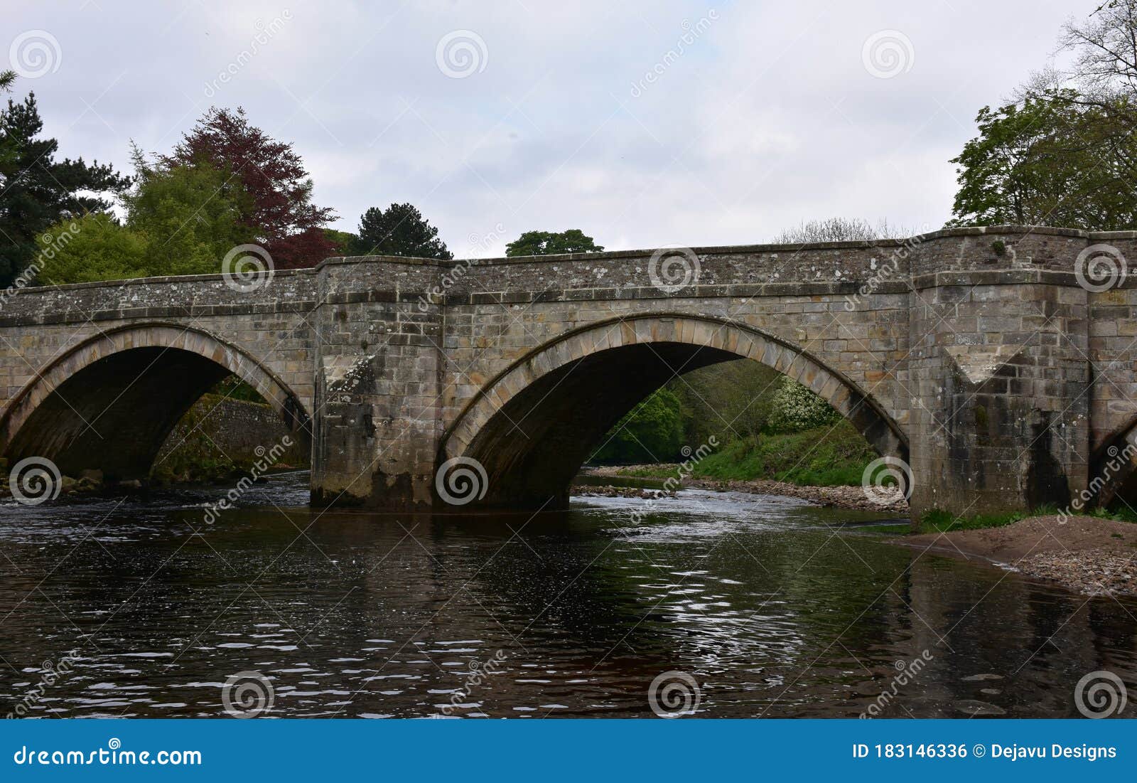 Old Stone Bridge with Arches Over a River Stock Photo - Image of stream ...