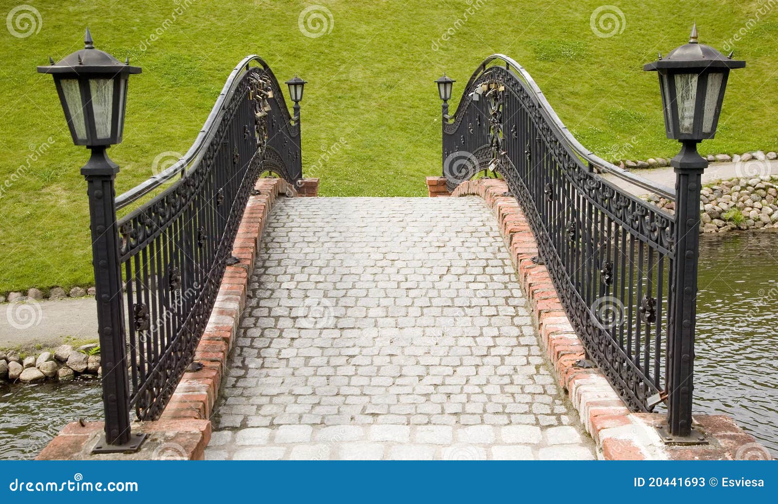 Stone Bridge with Metal Fences Over the River Stock Image - Image of ...