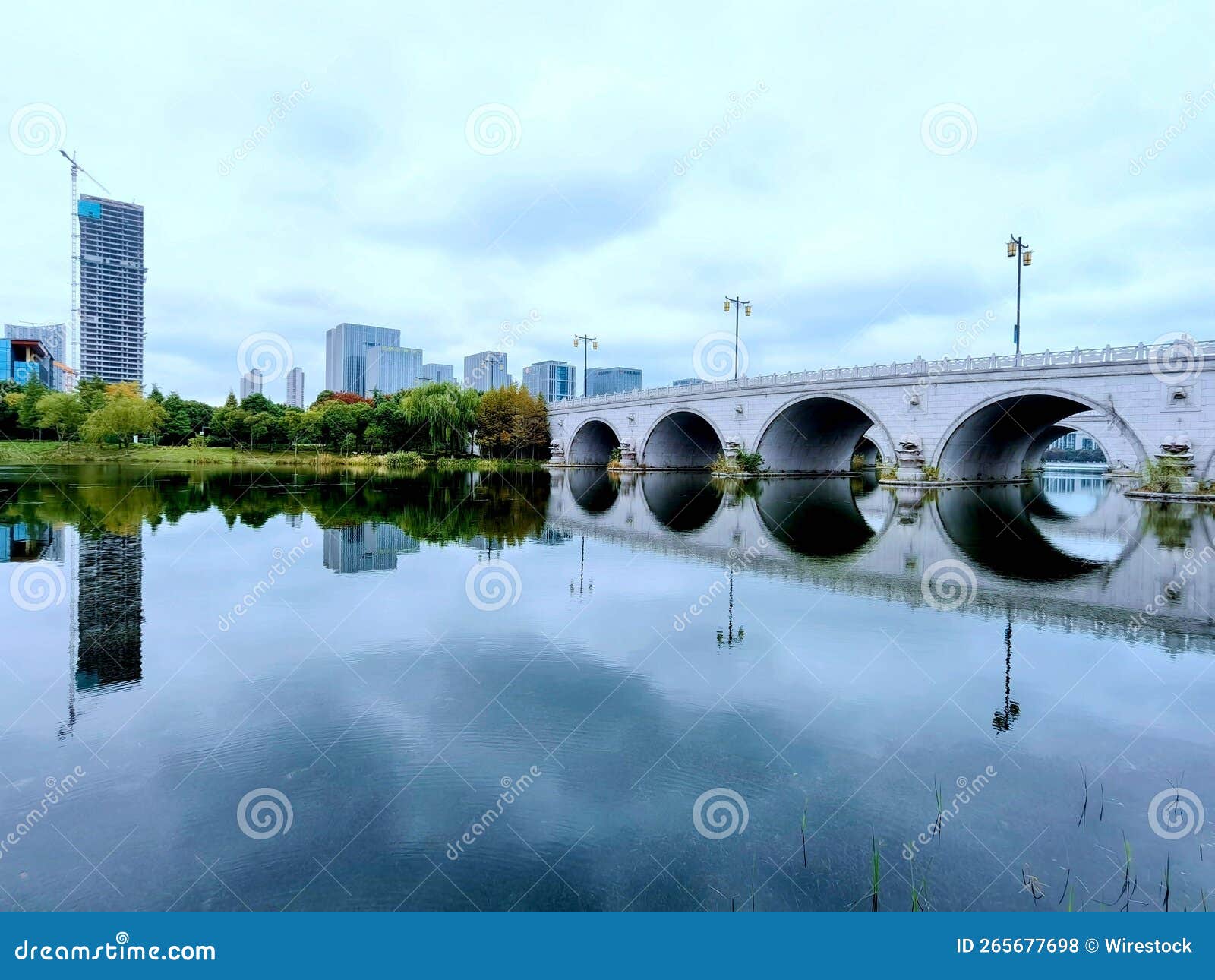 Stone Bridge in a Modern City in the Daylight Stock Photo - Image of ...