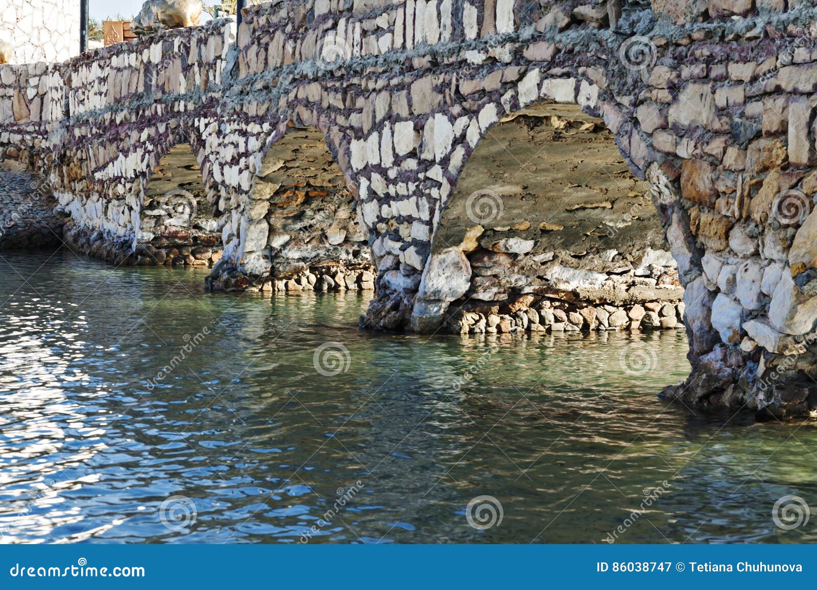 Stone Bridge Over a Close-up Perspective River Stock Image - Image of ...
