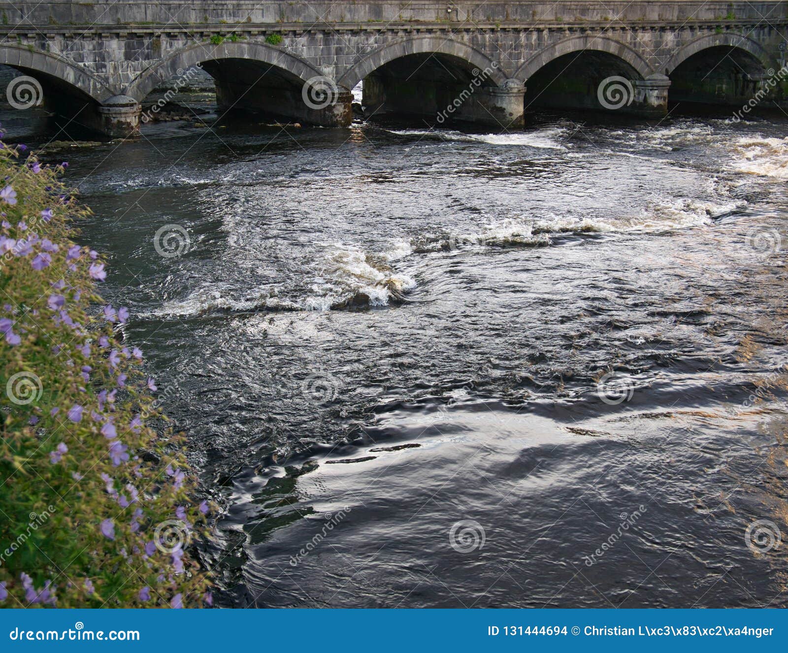 Stone Bridge Over the Garavogue River in Sligo Stock Photo - Image of ...