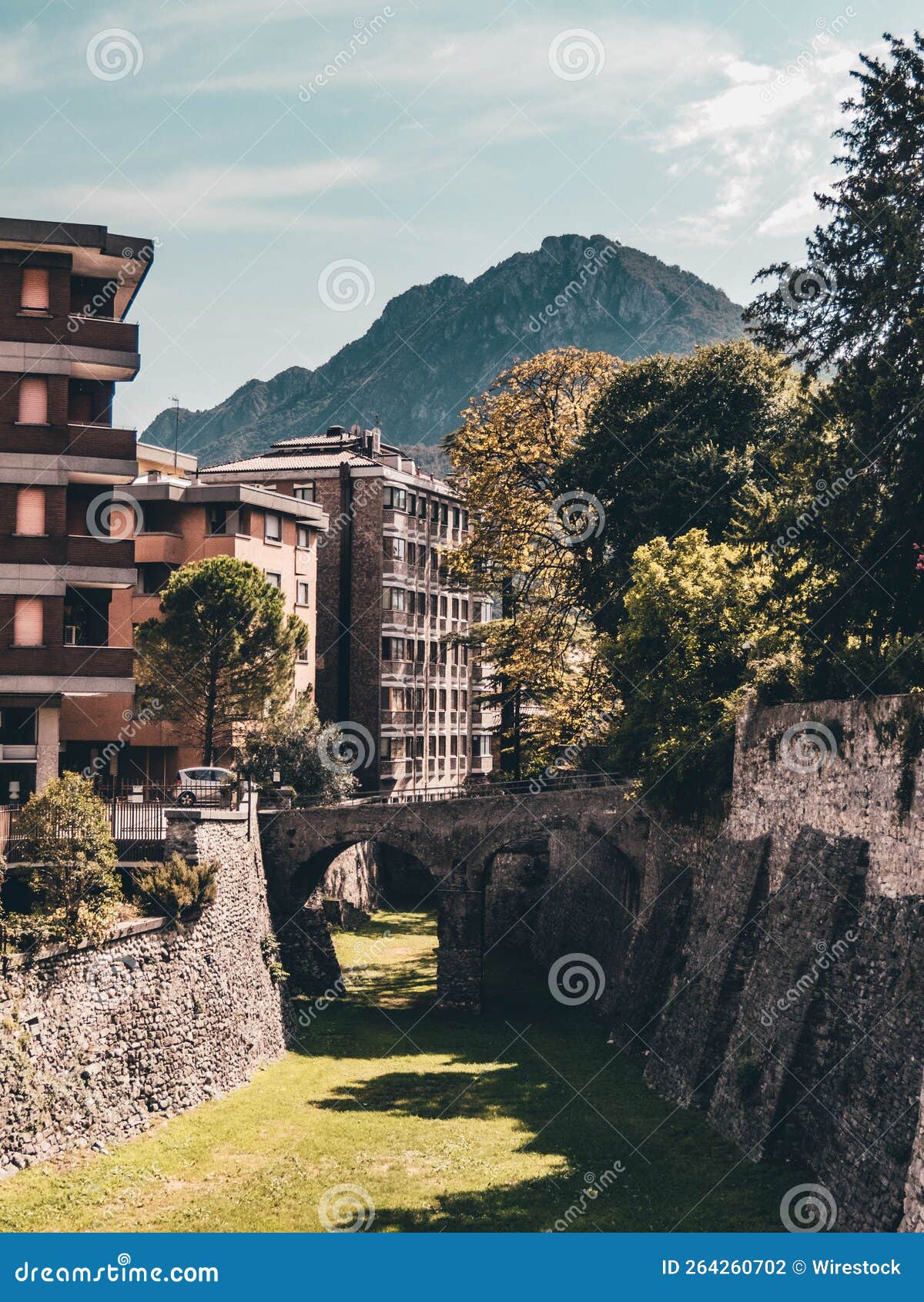 Stone Bridge Over the Grass Path in a City Editorial Photography ...