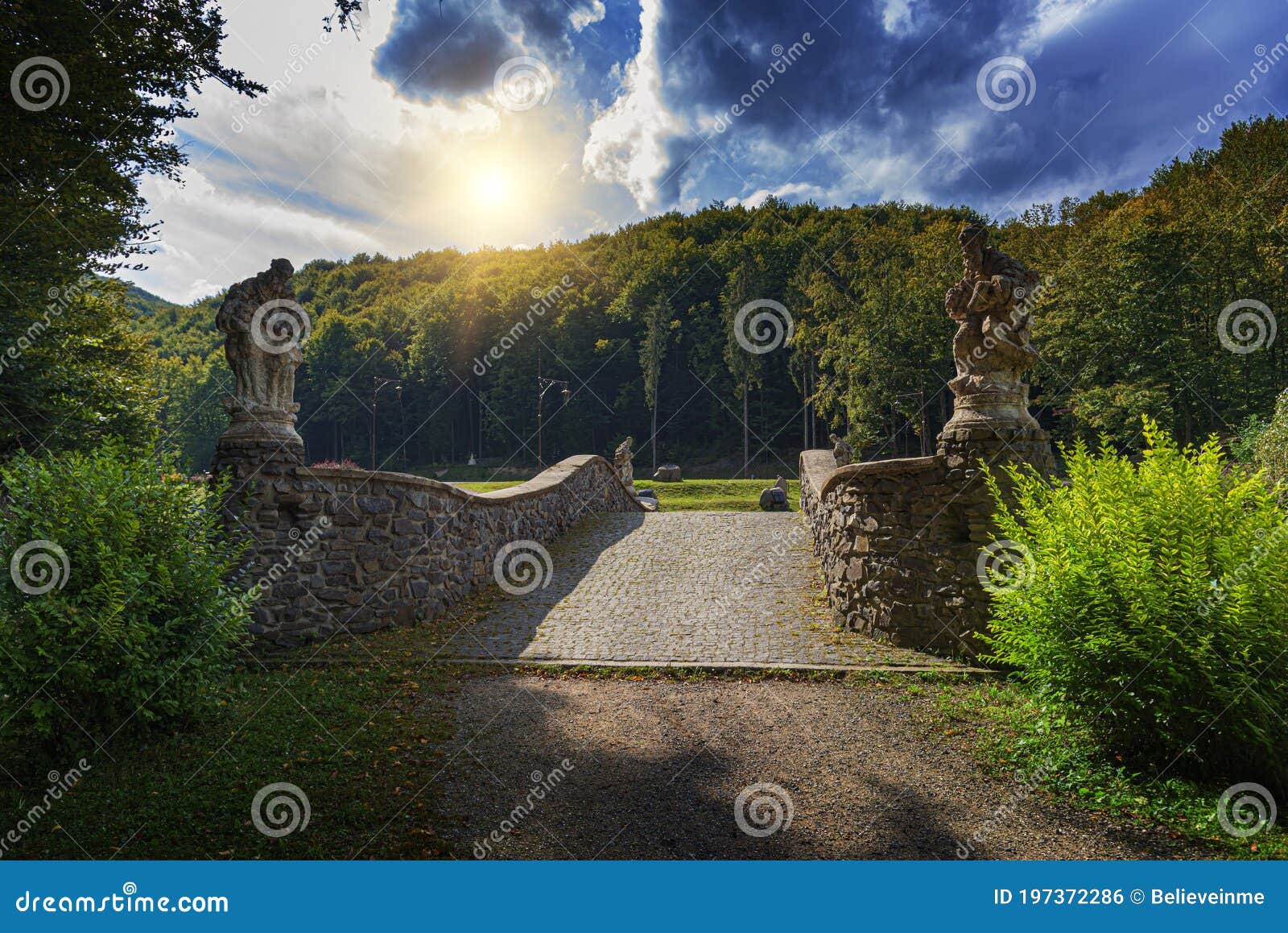 Stone bridge in the park. stock photo. Image of moss - 197372286