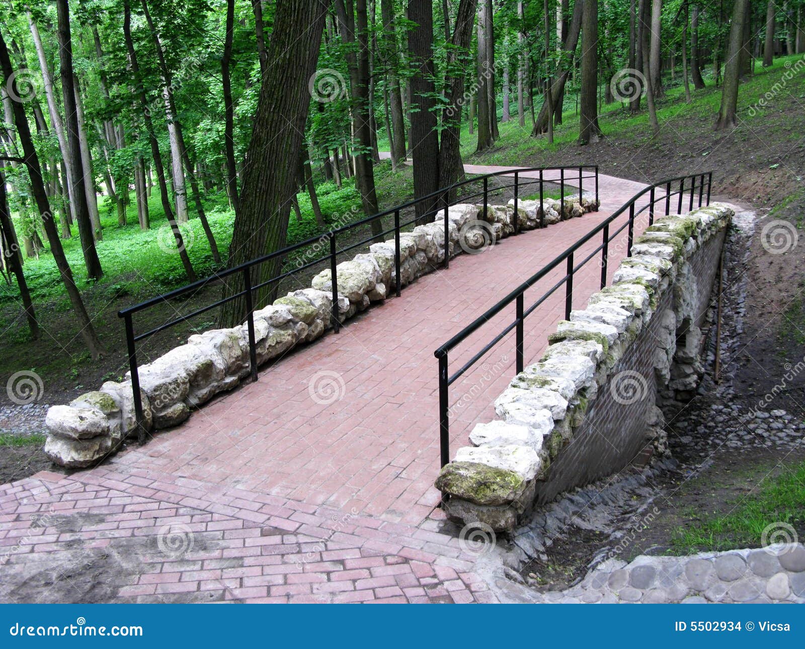 Stone bridge in park stock photo. Image of brick, bridge - 5502934