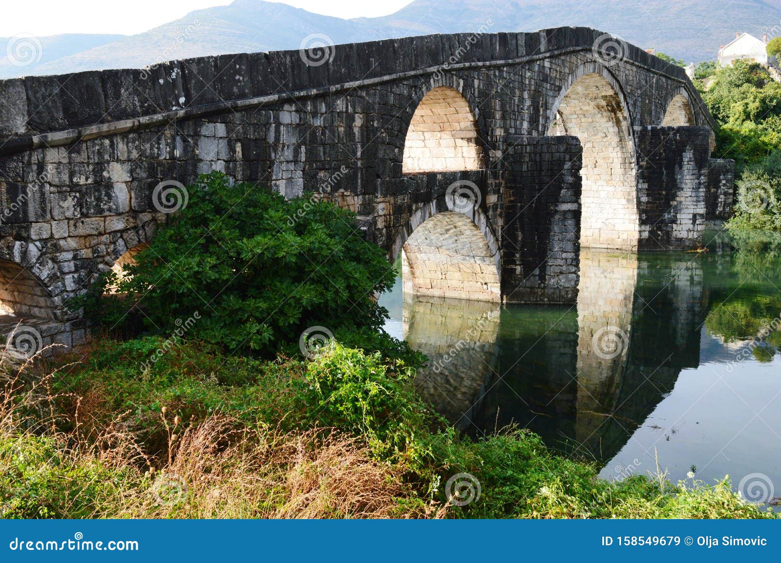 Stone Bridge and Reflection on River Stock Image - Image of color ...