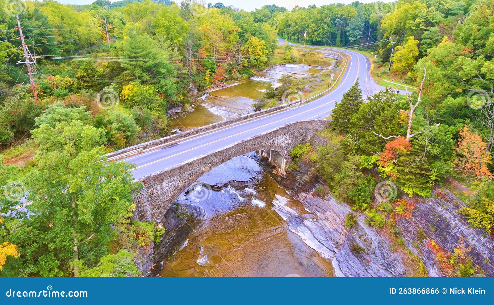 Stone Bridge Road Crosses Over Bridge in New York Fall Forest Stock ...