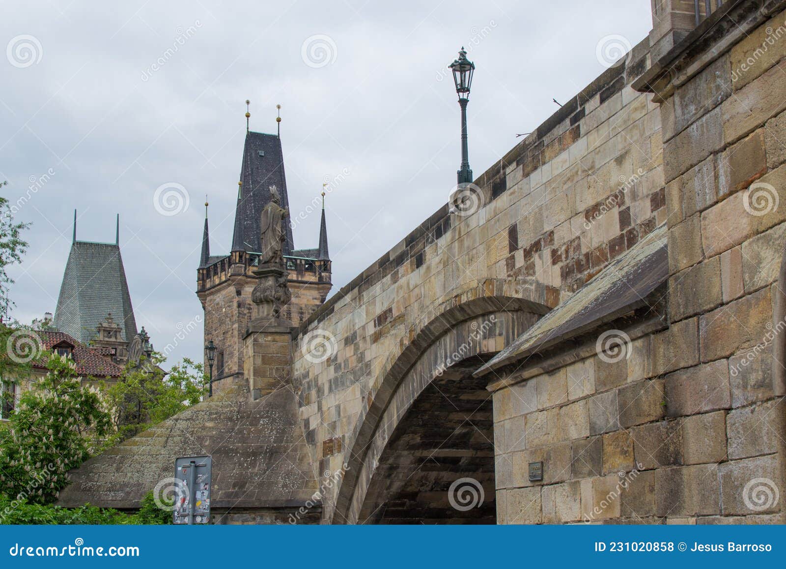 Stone Bridge with a Tower at the Background in the Center of Prague ...