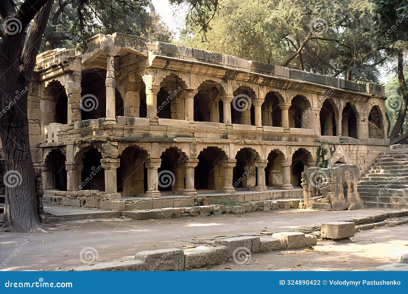 A Stone Building with Arches and Columns Stock Photo - Image of ...