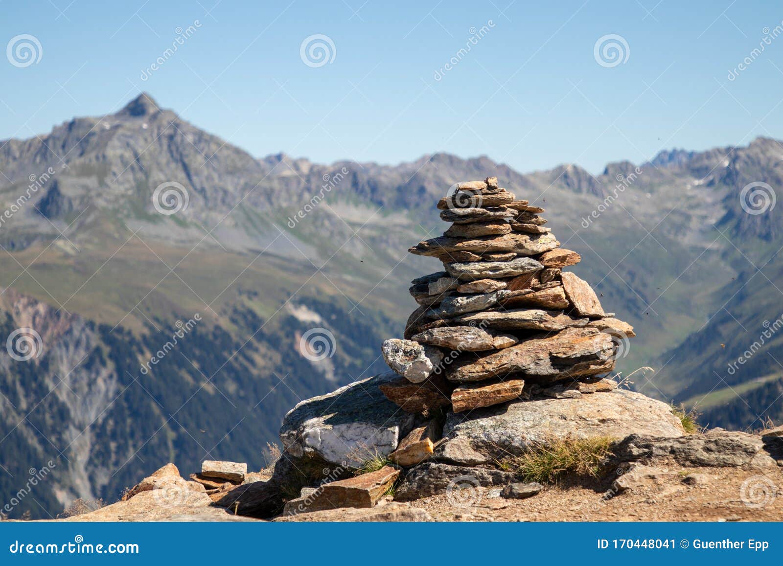Stone Cairn in the Mountains Stock Image - Image of blue, wandern ...
