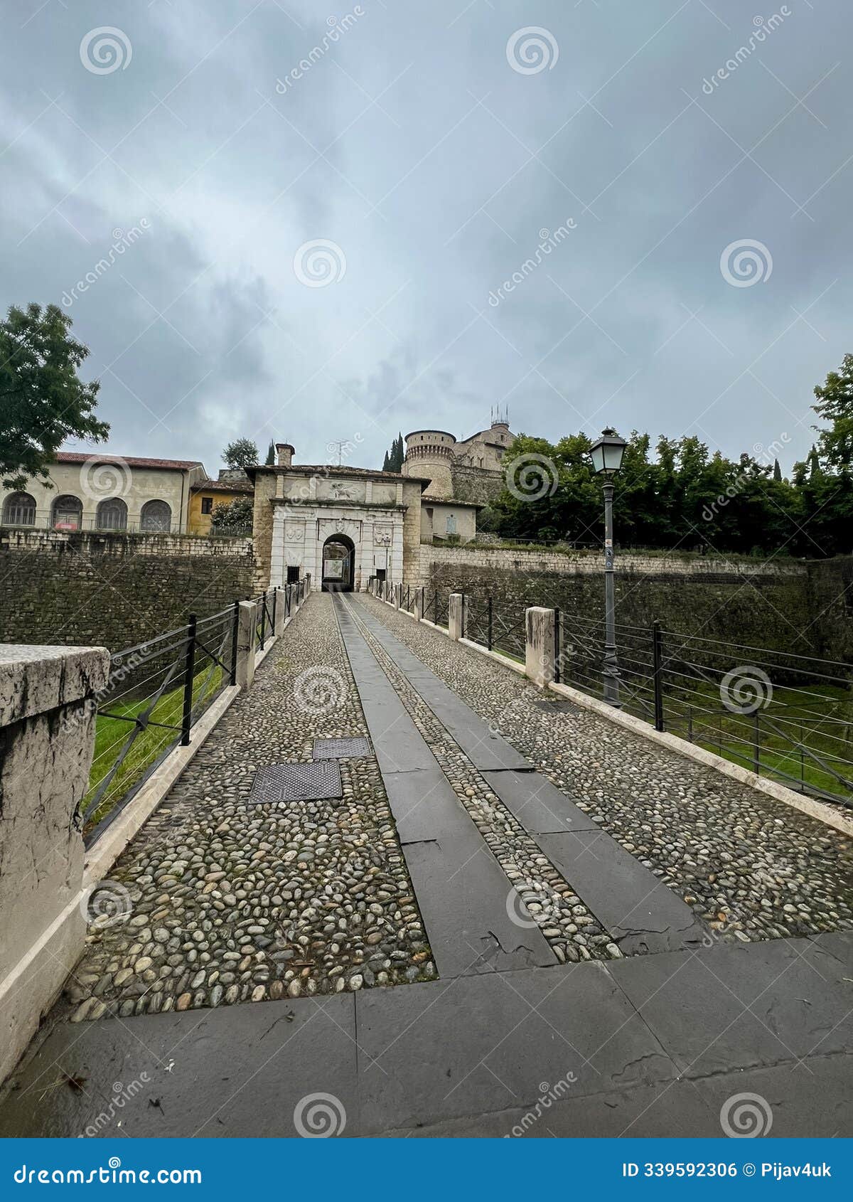 Ancient European Castle with Round Tower and Walkway Along the Top of ...