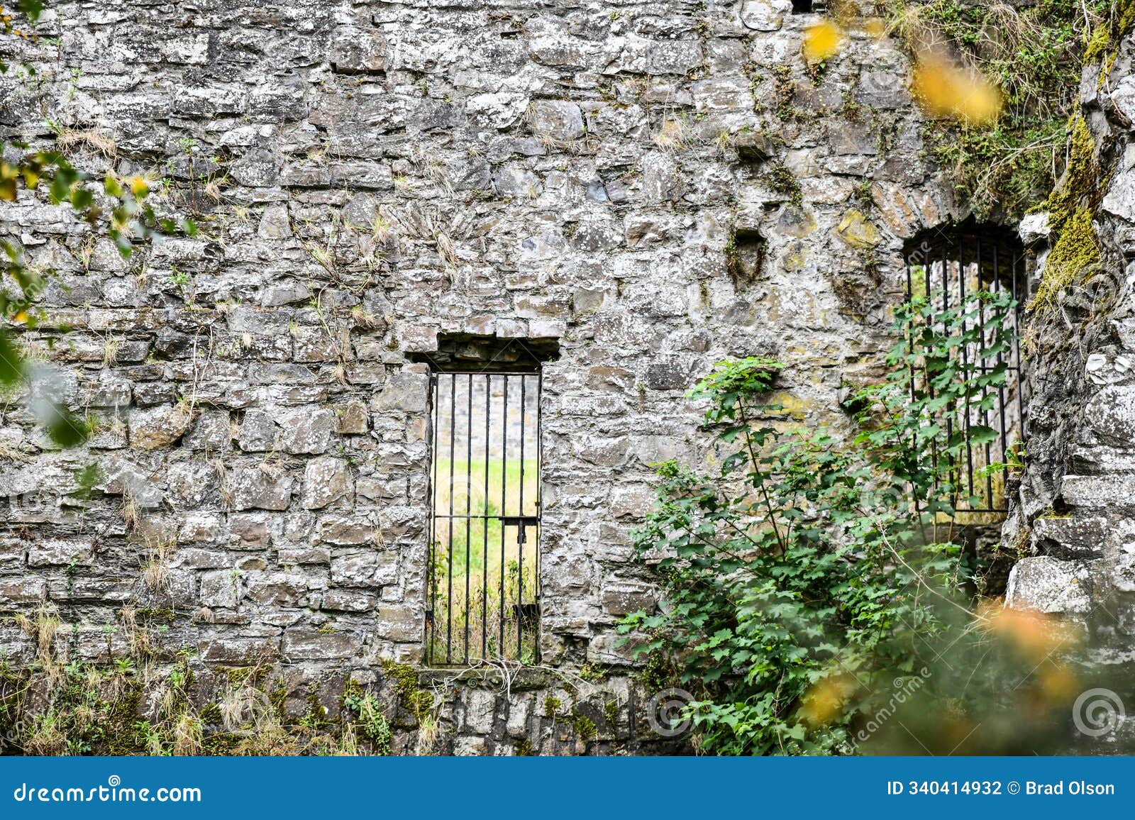 Stone Castle Wall with Iron Bar Window and Door Stock Photo - Image of ...