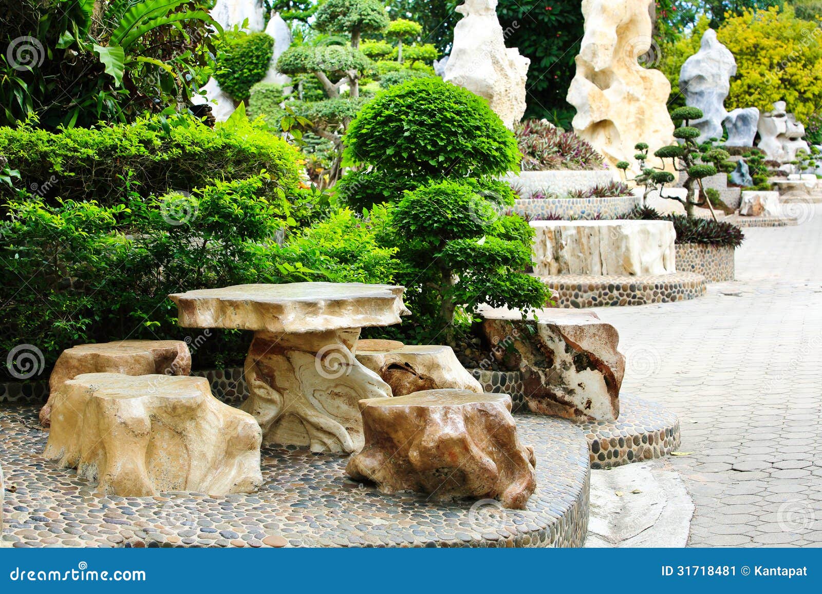 Stone Chair and Table in the Garden. Stock Image - Image of chair, lawn ...