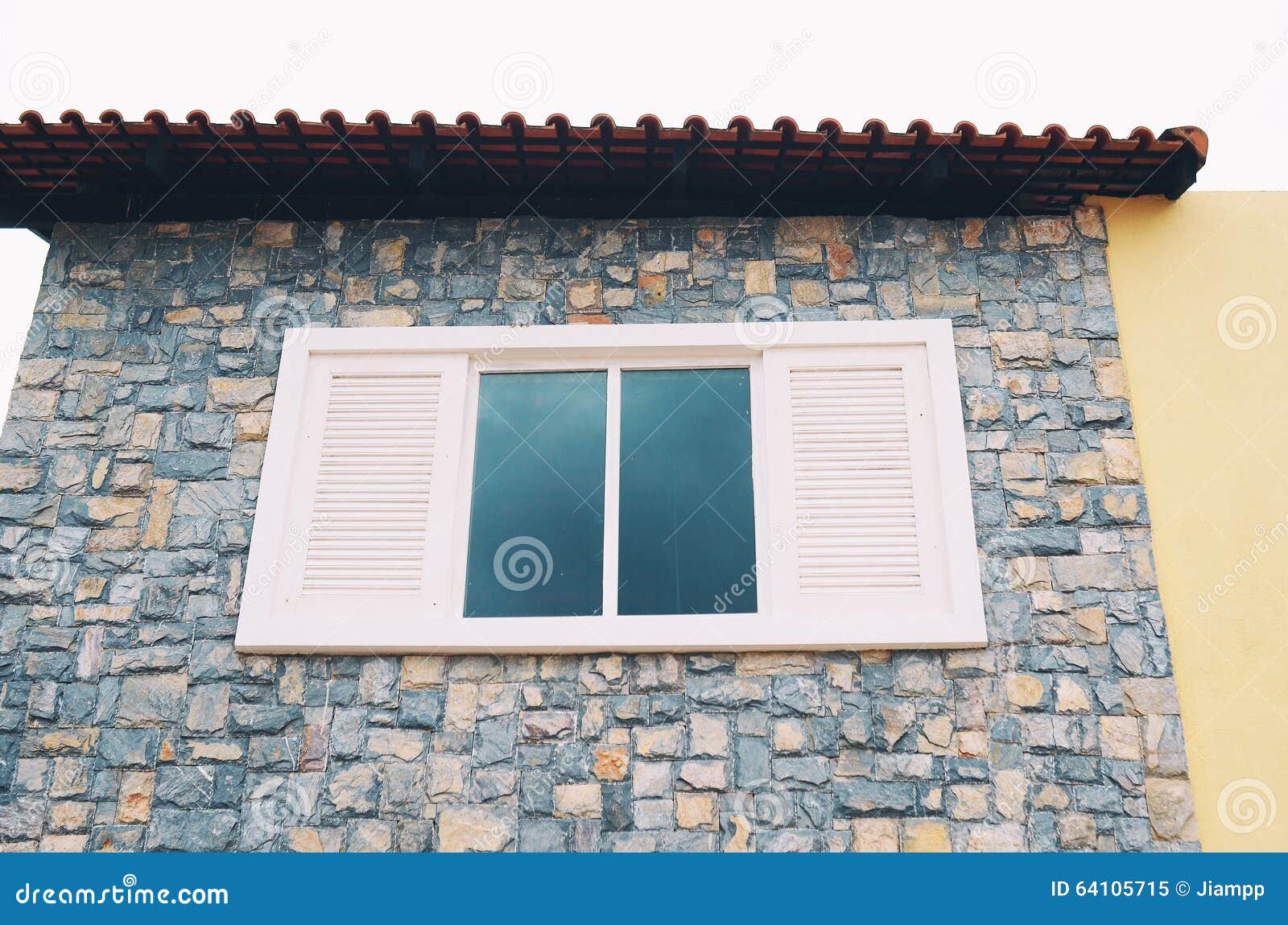 Stone Cladding Plates on the Wall with One Window Stock Image - Image ...