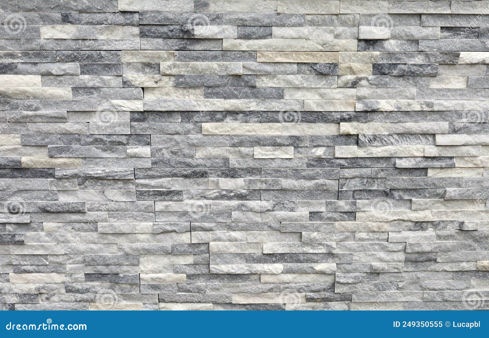 Stone Cladding Wall Made of Regular Bricks of White, Gray and Black ...