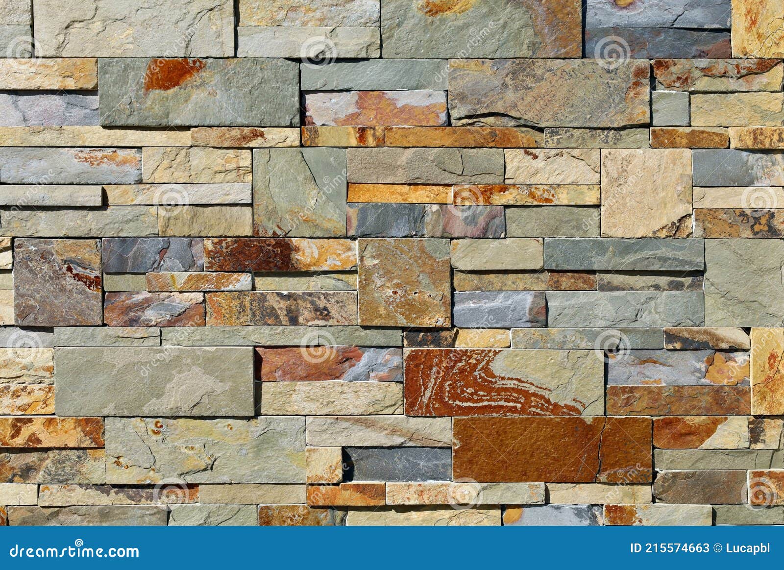Stone Cladding Wall Made of Stacked Slabs of Natural Multicolor Rocks ...