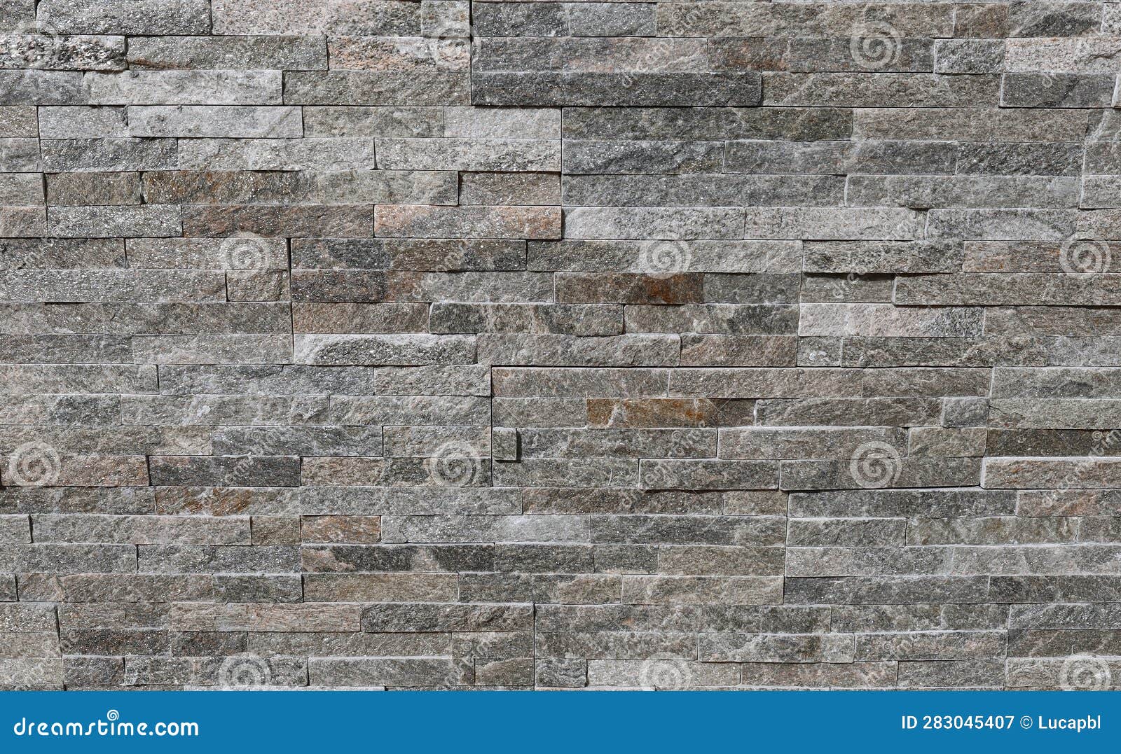 Stone Cladding Wall Made of Striped Stacked Bricks of Gray and Brown ...