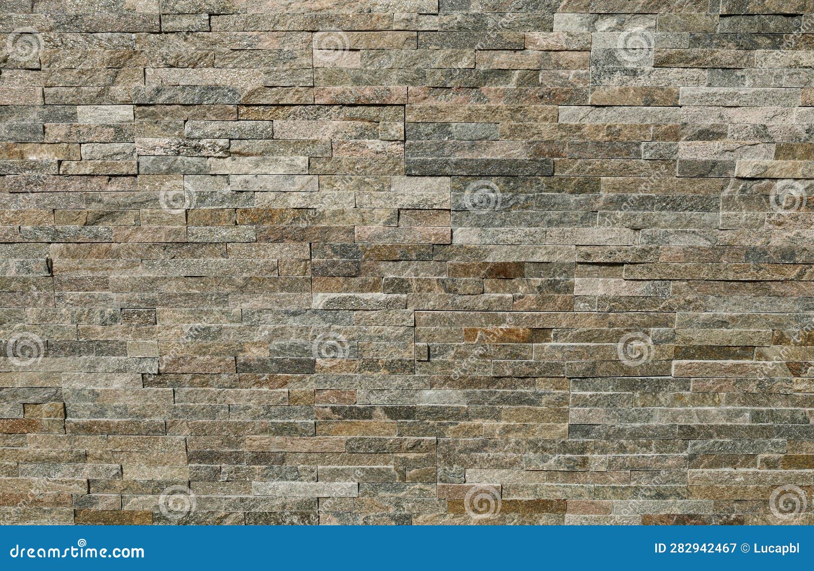 Stone Cladding Wall Made of Striped Stacked Bricks of Multicolor Rocks ...