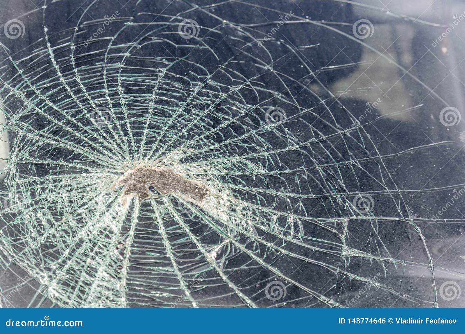 Stone or a Cobblestone Smashed the Windshield As it Flew into the Car ...